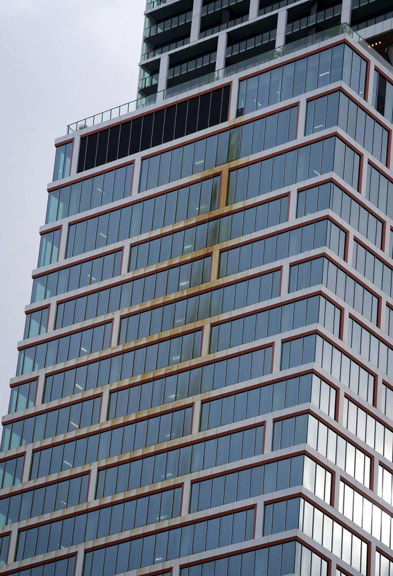Rust-colored stains have marred Texas' tallest building in Austin. Here ...