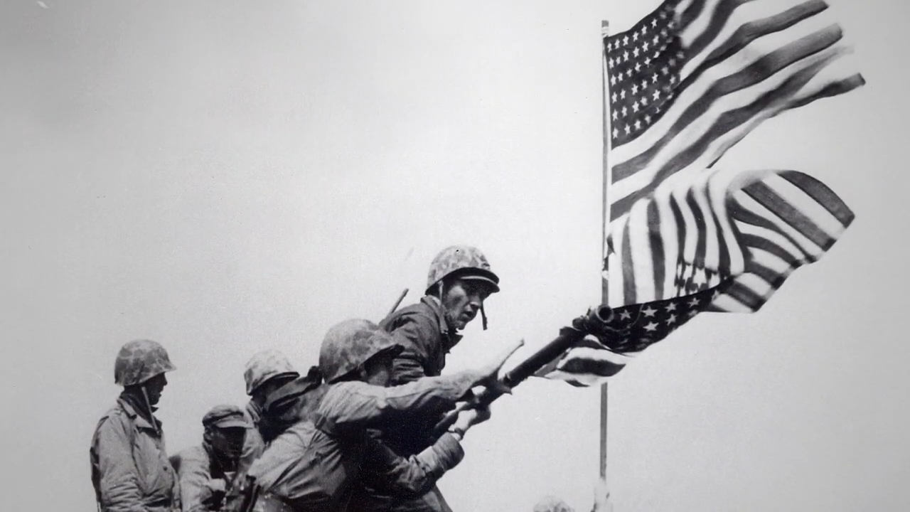 The hidden story behind the most famous World War II photo