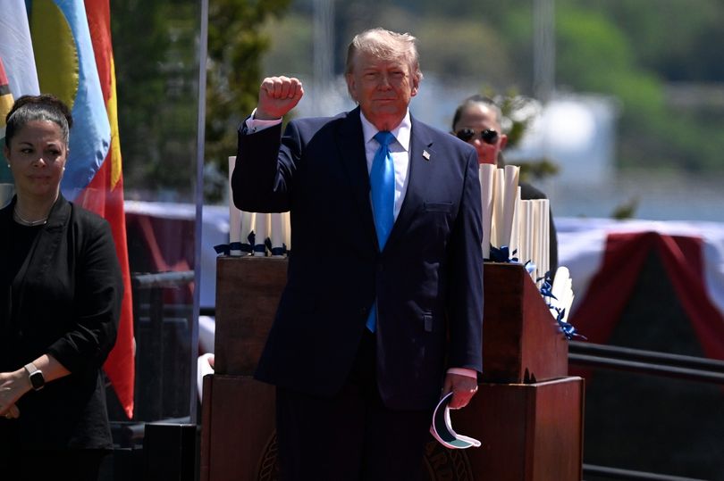 Trump's combover flies in strong wind as thinning hair revealed amid ...
