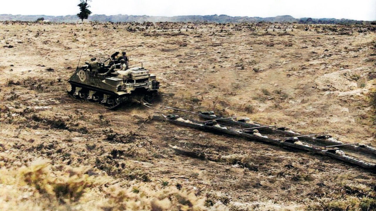 Rare WWII footage shows Sherman tank towing soldiers on battle sleds