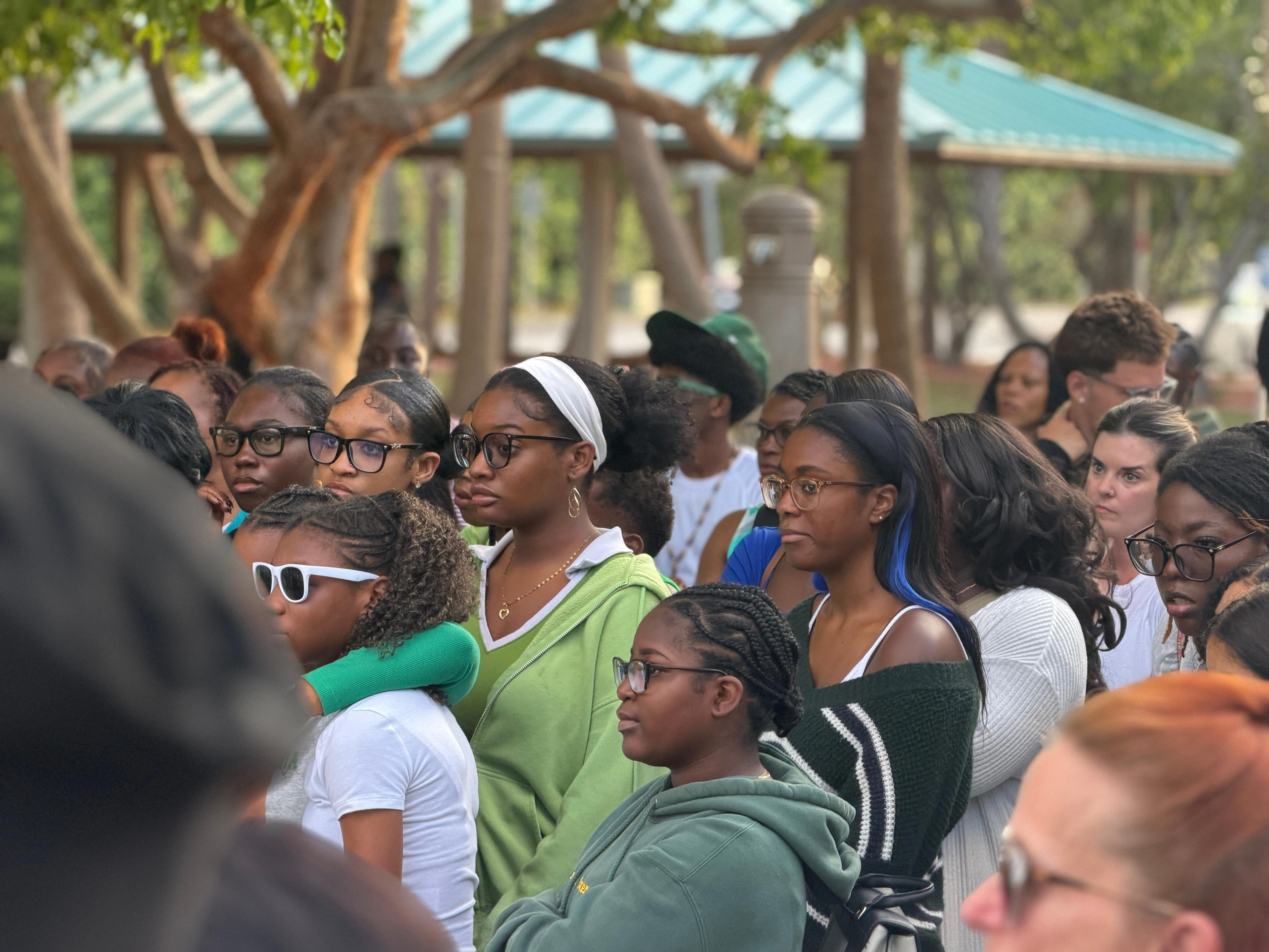 Inlet Grove grad remembered as shining star at vigil after fatal crash