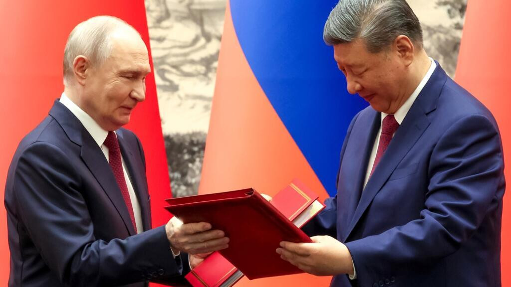 Donald Trump dismisses Vladimir Putin's Beijing pomp, claims his ...