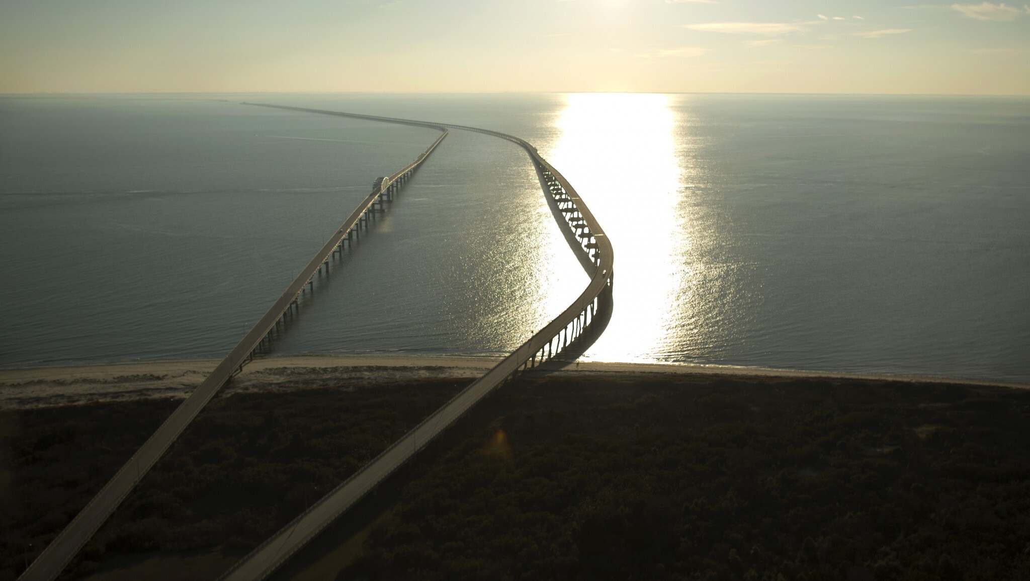 Chesapeake Bay Bridge-Tunnel police vehicle flips, hangs off bridge ...