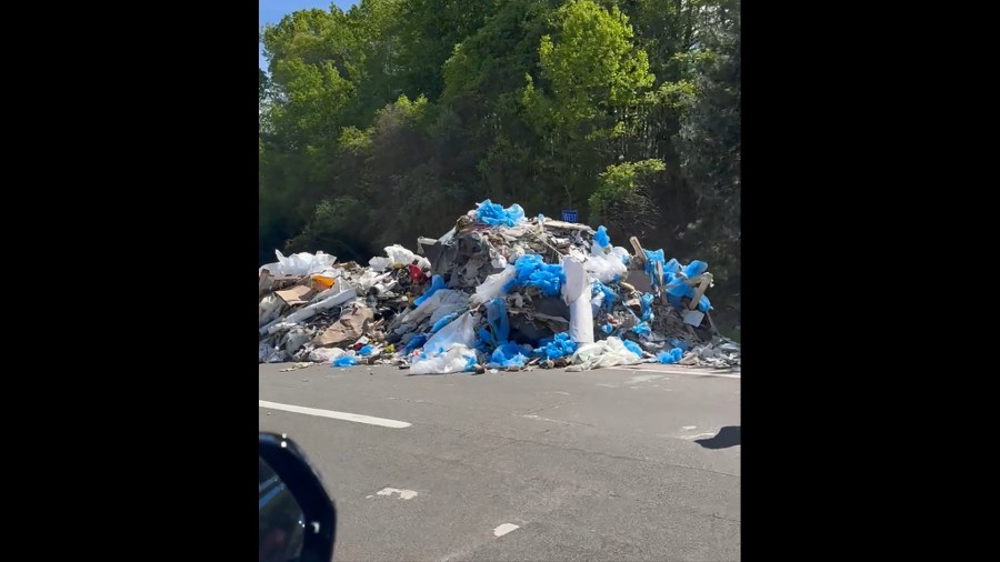 Trash truck catches fire on WB I-196 in Grand Rapids, causing backup
