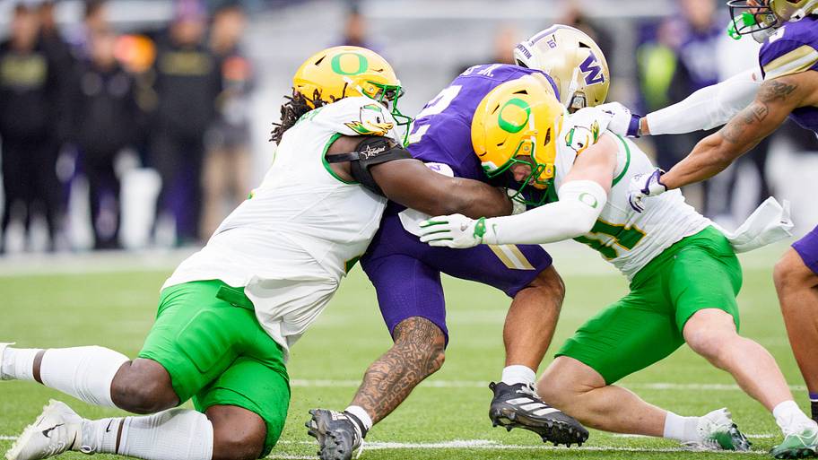 In a feeble effort to finally beat the Ducks, Washington fans try to ...