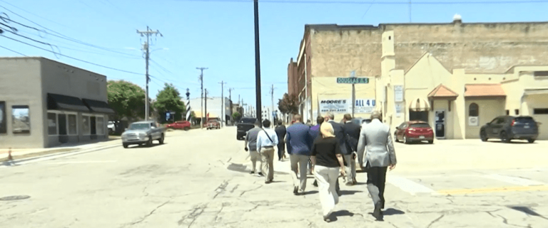 Wilson’s economic plan highlighted in downtown walking tour