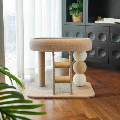 Chewy's ultra-modern cat climbing tower doubles as a chic decor piece