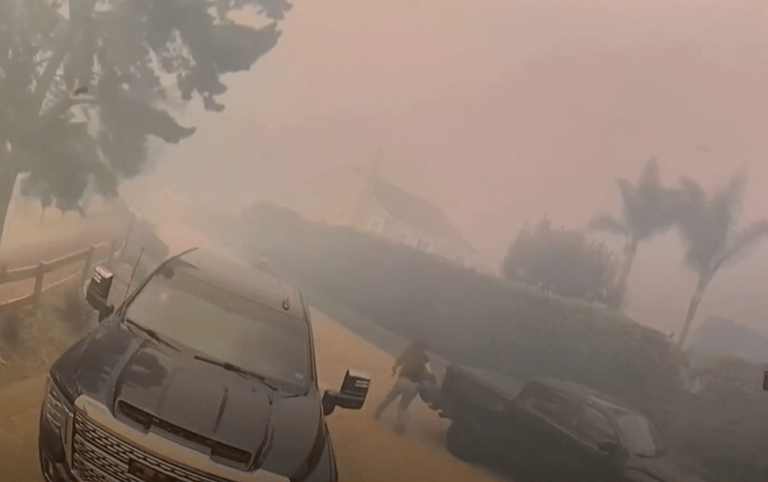 Apocalyptic scene as Sandy Fire sends homeowner fleeing for her life ...