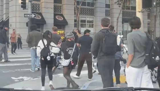 Bizarre scene as humanoid robots clog San Francisco crosswalk