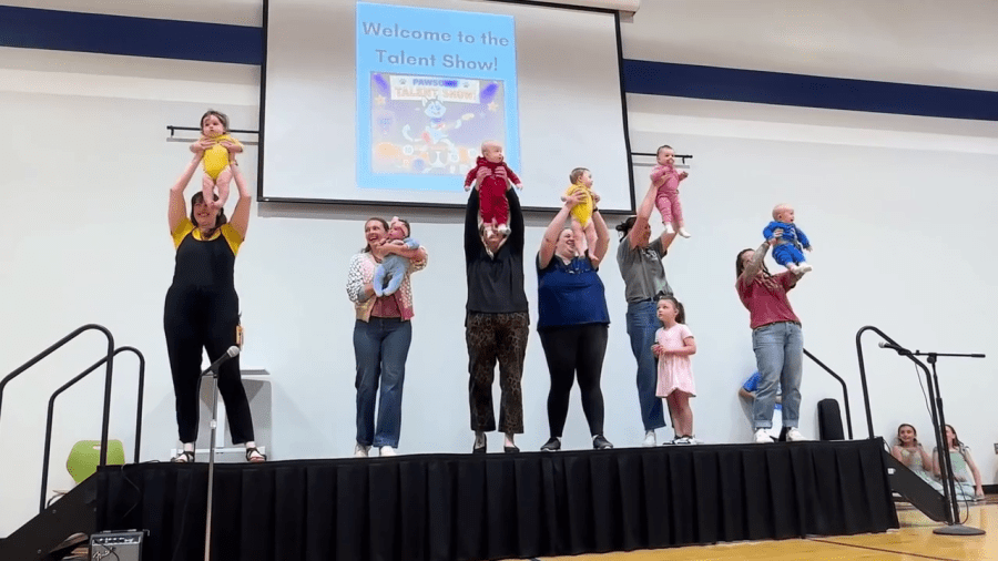 Six Derby elementary staff show off their babies at talent show
