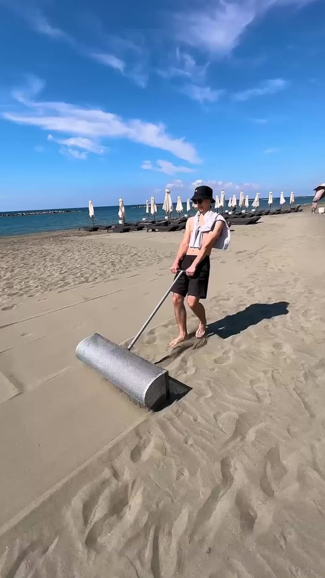 Filtering beach sand for hidden riches!