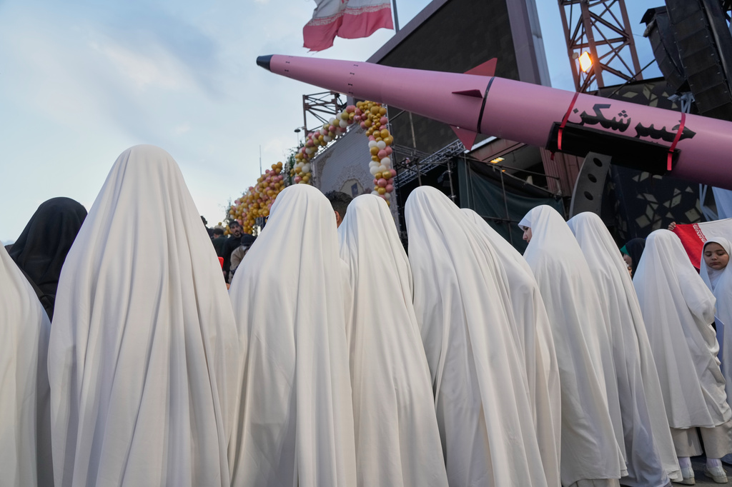 In Iran's capital, weapons demonstrations send a signal at home and ...