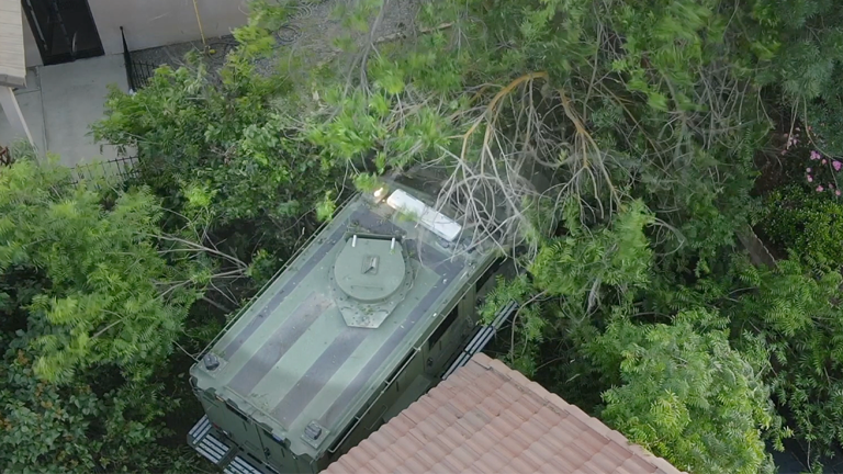 Video shows police take down cop killer with armored vehicle after ...
