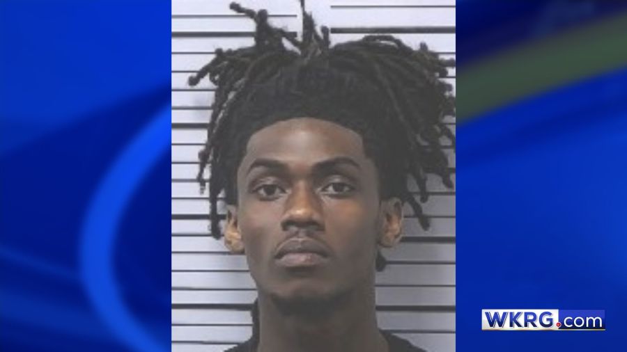 Mobile man arrested after vehicle struck by bullets