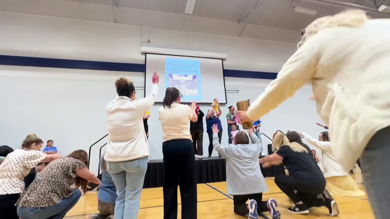 Six Derby elementary staff show off their babies at talent show