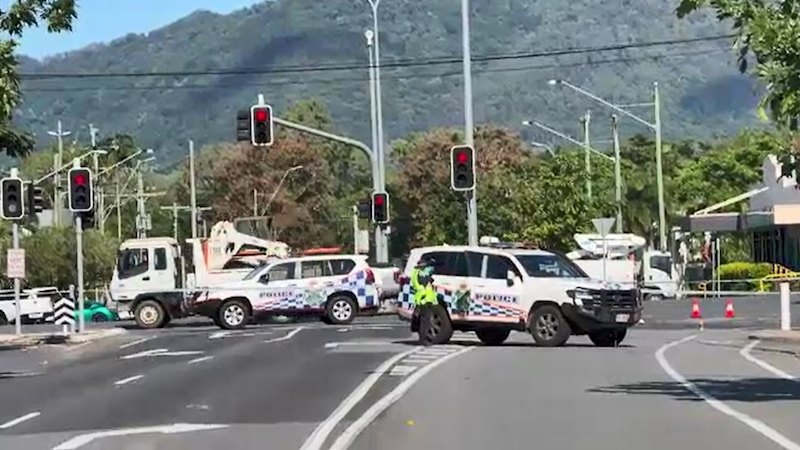 Woman dies after being struck by police car