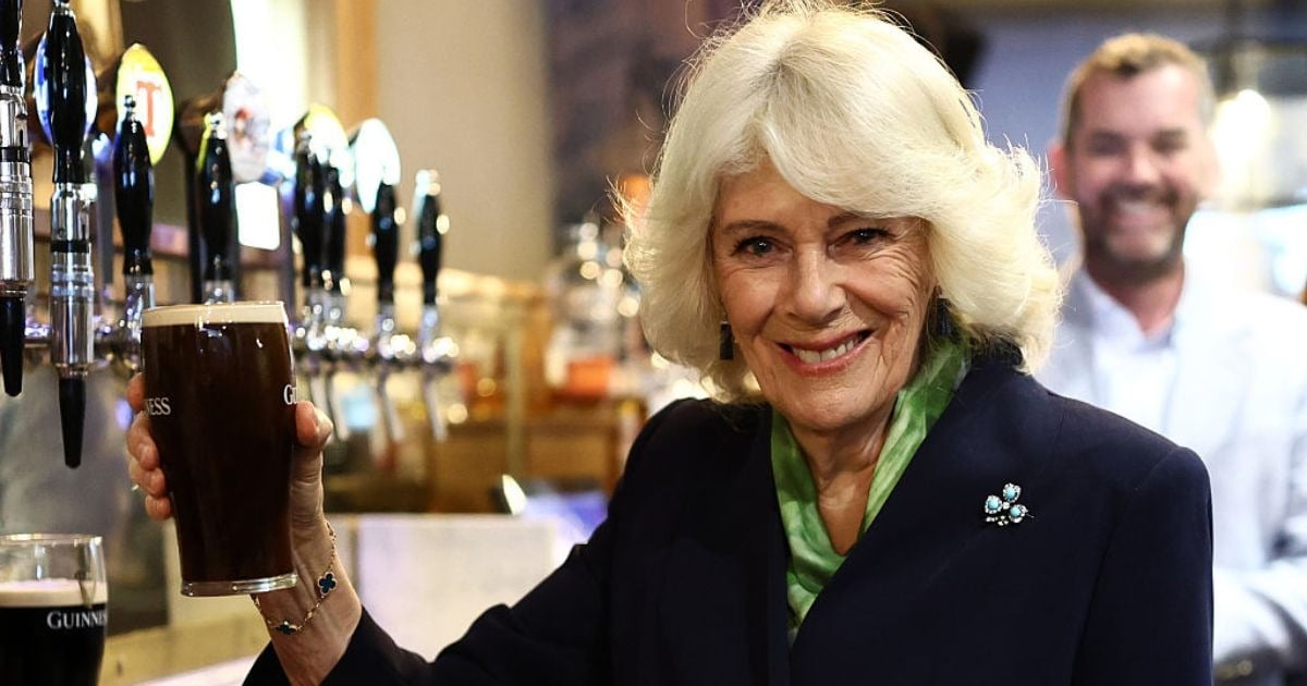 In photos: Queen Camilla looks really proud of herself after she pours ...