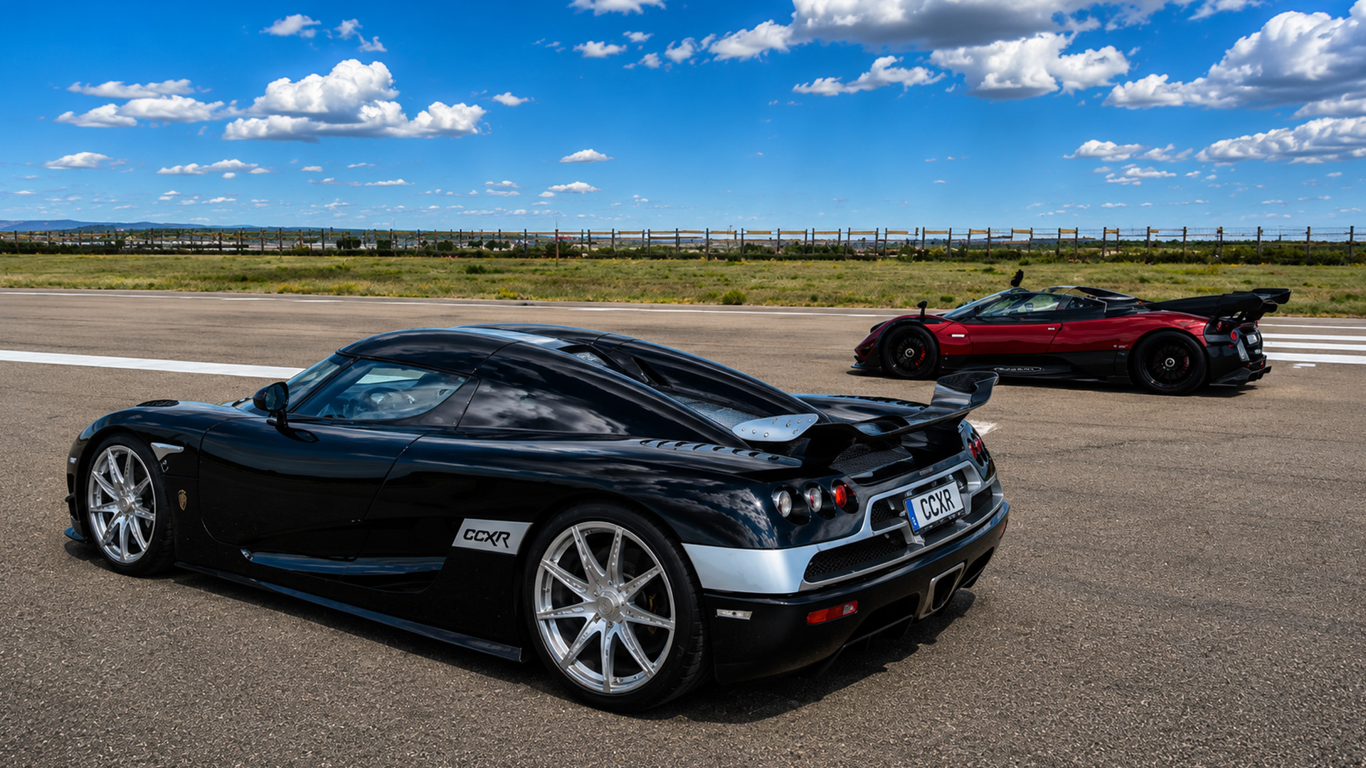 Rare hypercars turn a runway into a drag strip