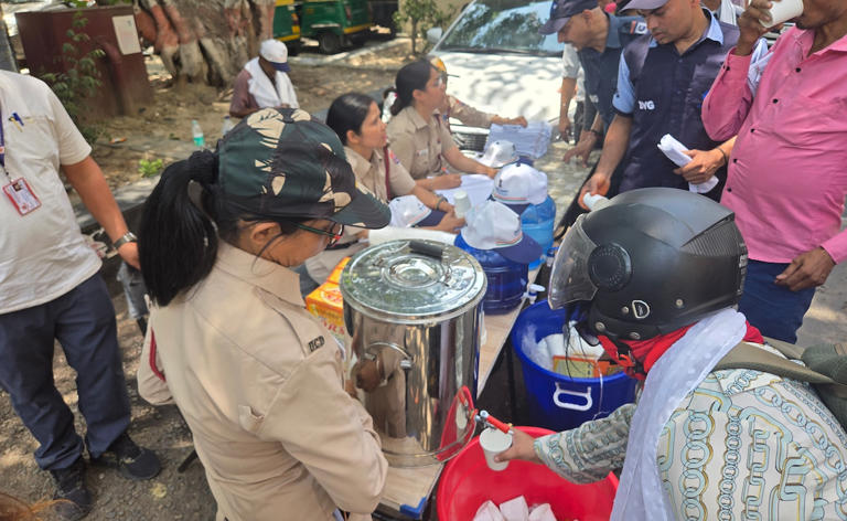 Caps, cold water, ORS: Delhi's heat relief vans see rush as city ...