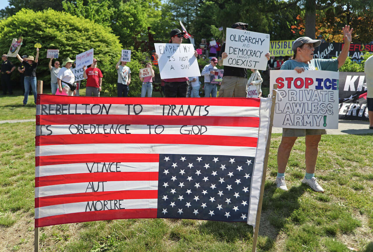Hundreds protest Trump in New London leading into Coast Guard commencement