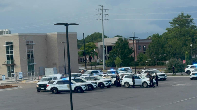 Several police officers present in downtown Huntsville parking lot