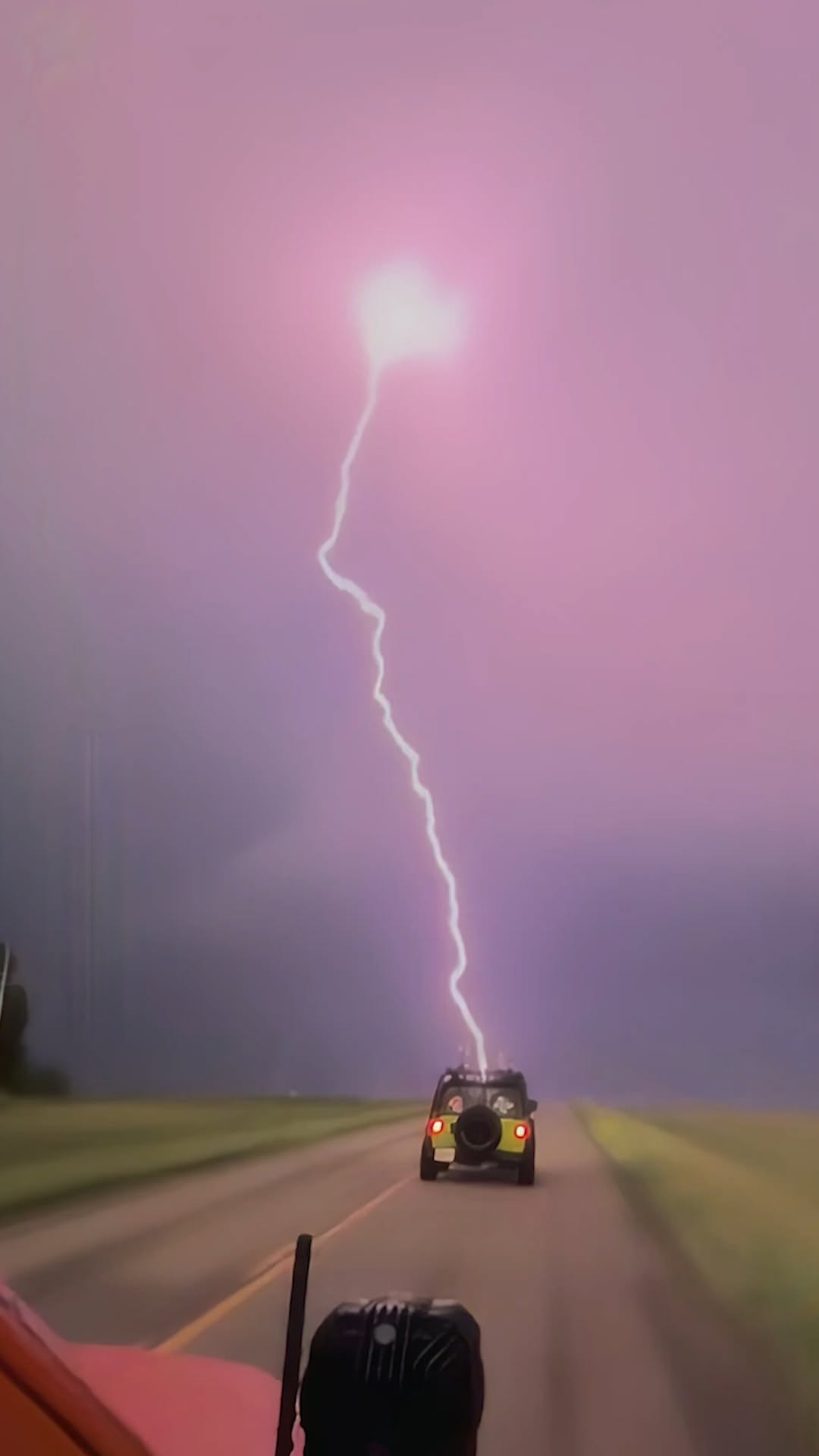 Tornado supercell lightning strikes overhead chaos