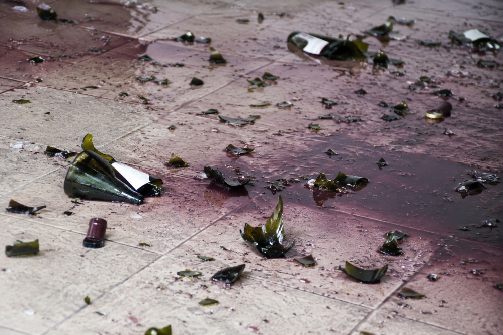Wine bottles rain down from Woodlands HDB unit as Singapore police lock ...
