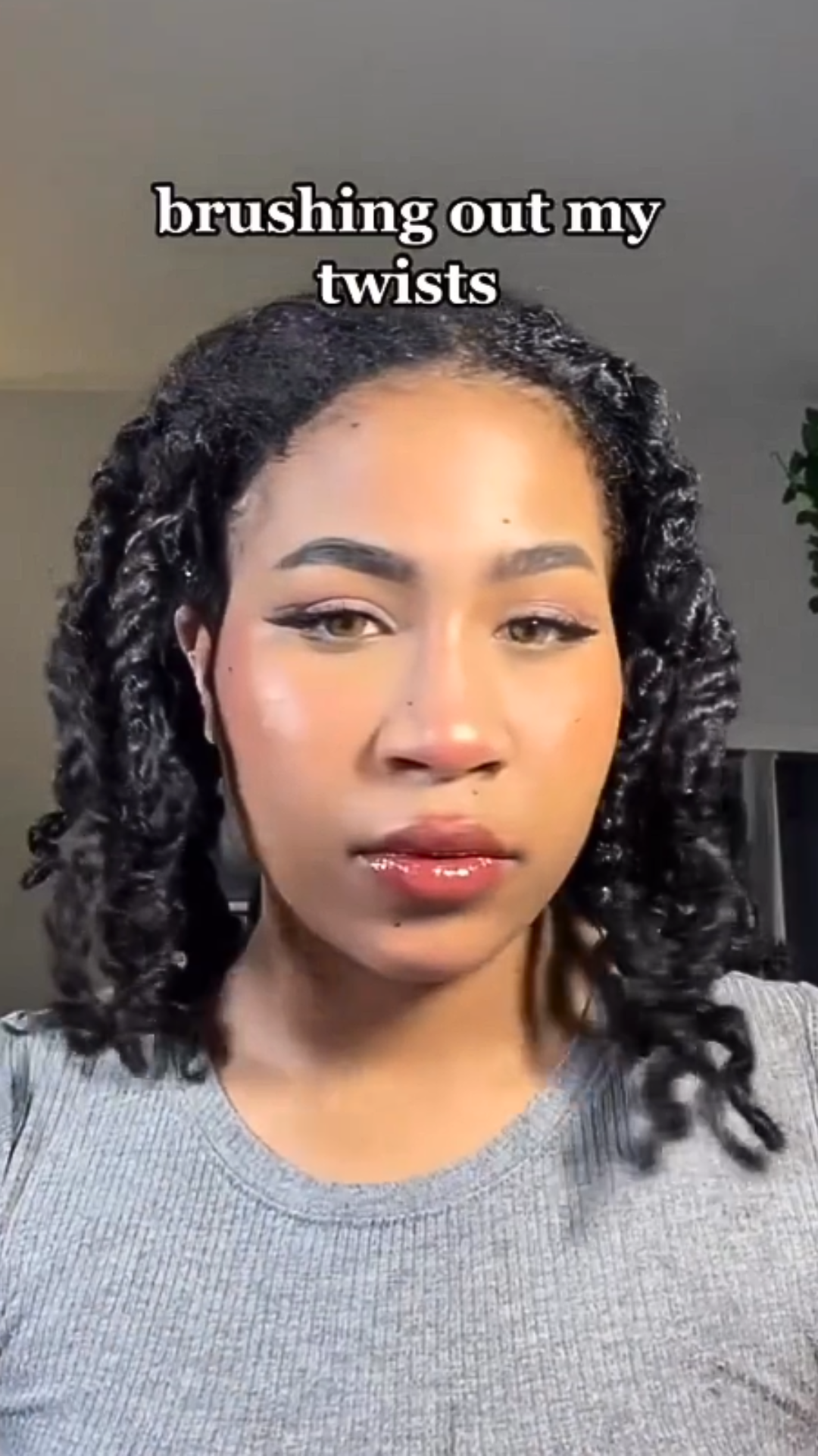 Brushing out twists on natural curly hair
