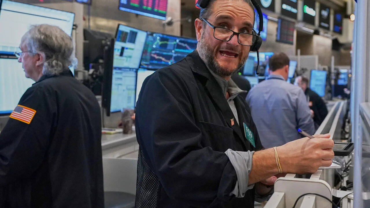 US stocks surge as bond market pressure eases and oil prices decline