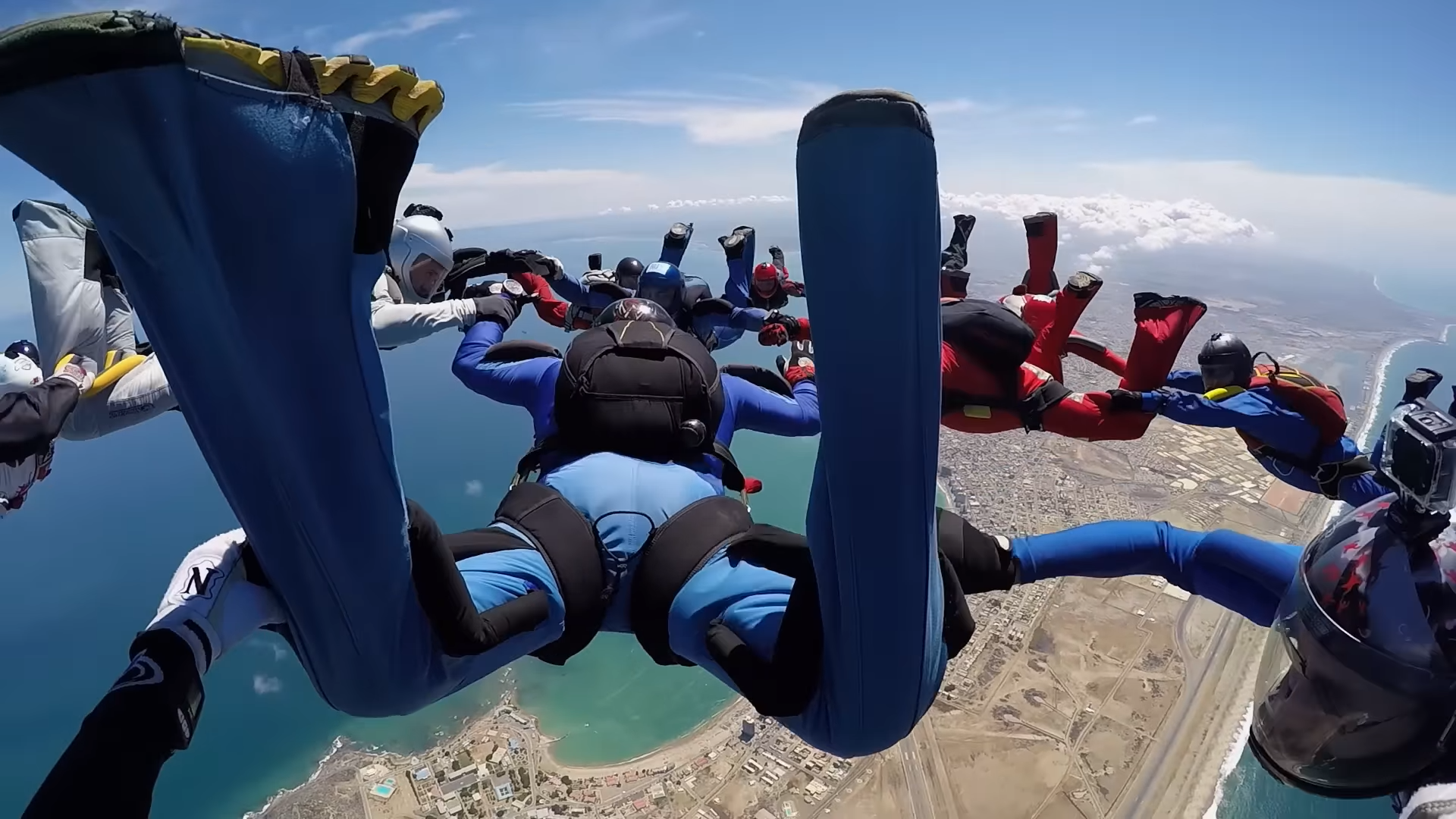 Watch US Air Force paratroopers jump from 13,000+ feet - 120+ mph freefall