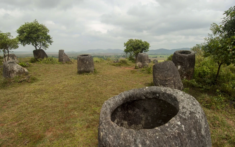 Archaeologists uncover 37 human remains in Laos stone jar