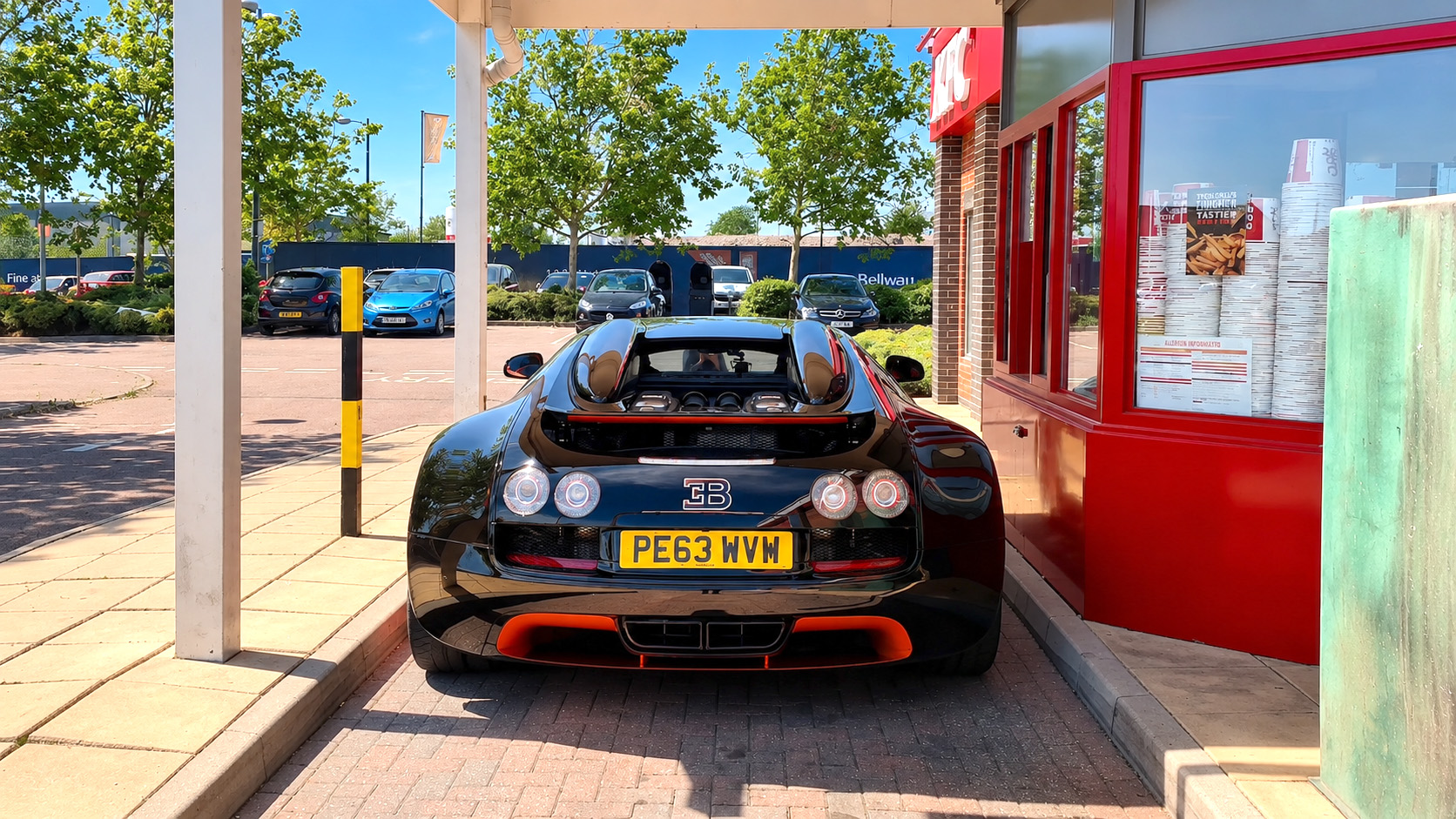Can a Bugatti fit through a fast food drive-through?