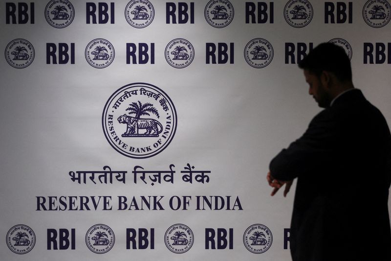 India's central bank revives aggressive pre-market intervention to ...