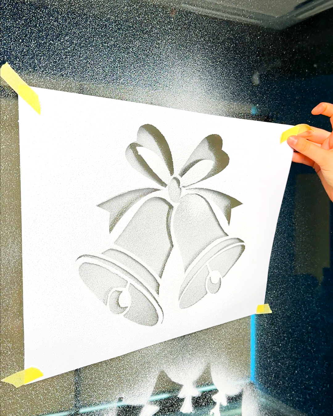 Create frosty window art with spray snow ️