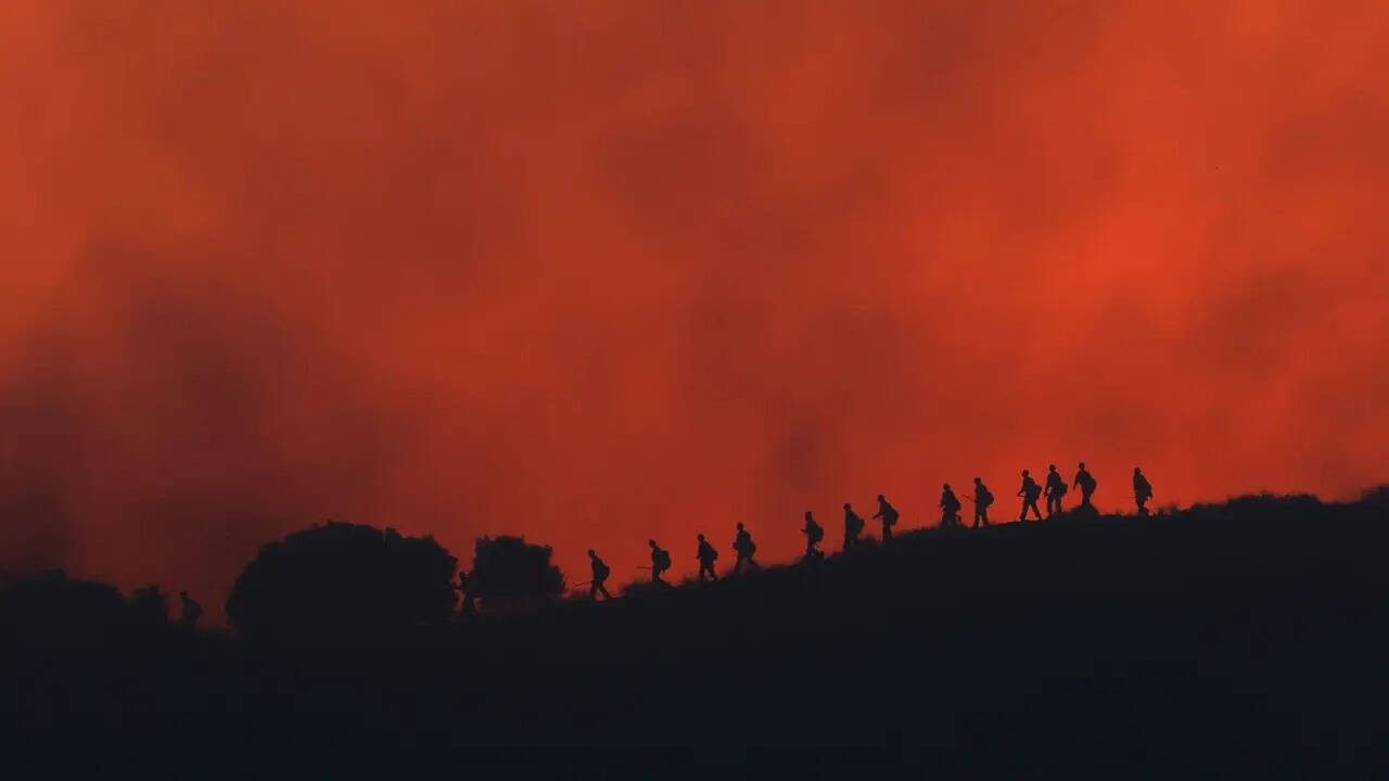 Massive wildfires ravage Southern California, over 17,000 evacuated ...