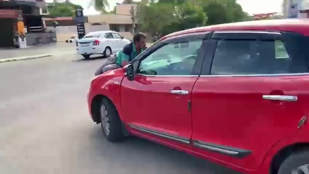 Caught on camera: Man dragged 500 metres on car bonnet over loan dispute