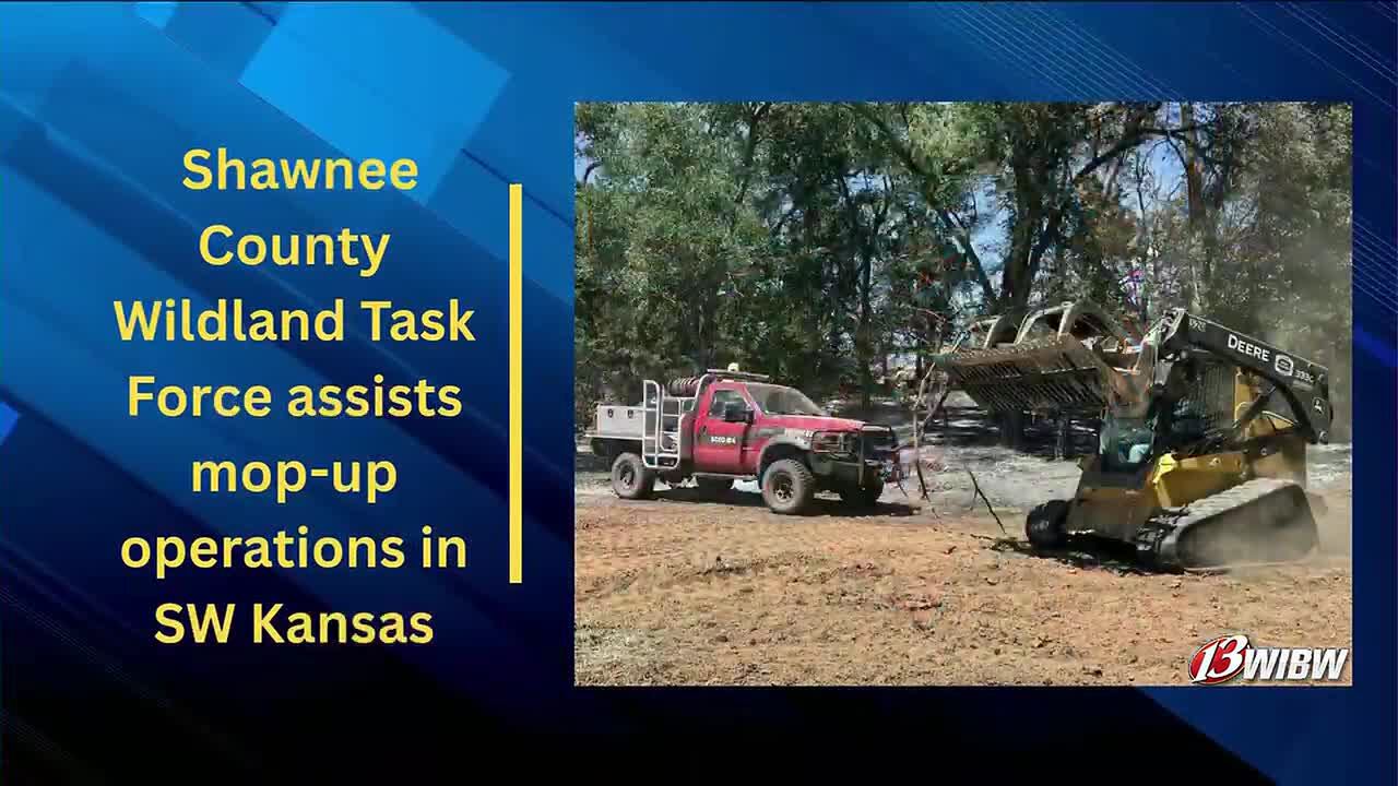 Local fire personnel assist with mop-up operations from Tuesday burns