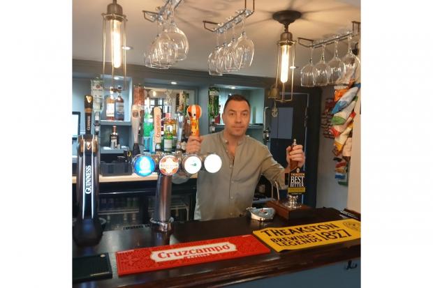 Robbie Williams impersonator brings sweet music to re-opened North ...