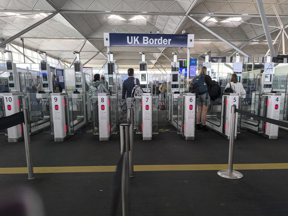 UK net migration halves after huge drop in non-EU arrivals