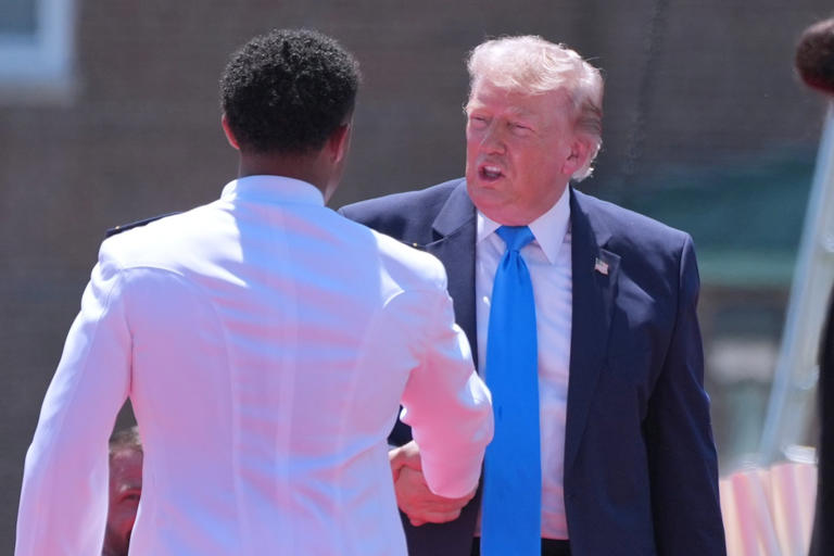 Excruciating moment Trump 'checks out' young cadets and feels their muscles