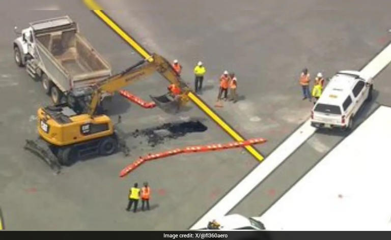 Sinkhole near New York's LaGuardia Airport shuts runway, causes massive ...