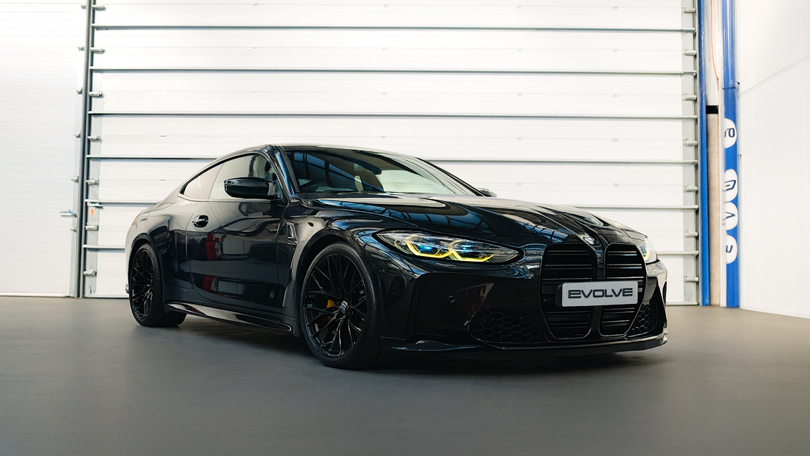 Stealth black G87 M2 enhanced with premium carbon upgrades