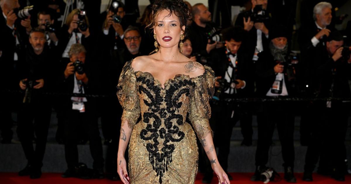 Halsey's Vivienne Westwood gown features plunging neckline & sky-high slit
