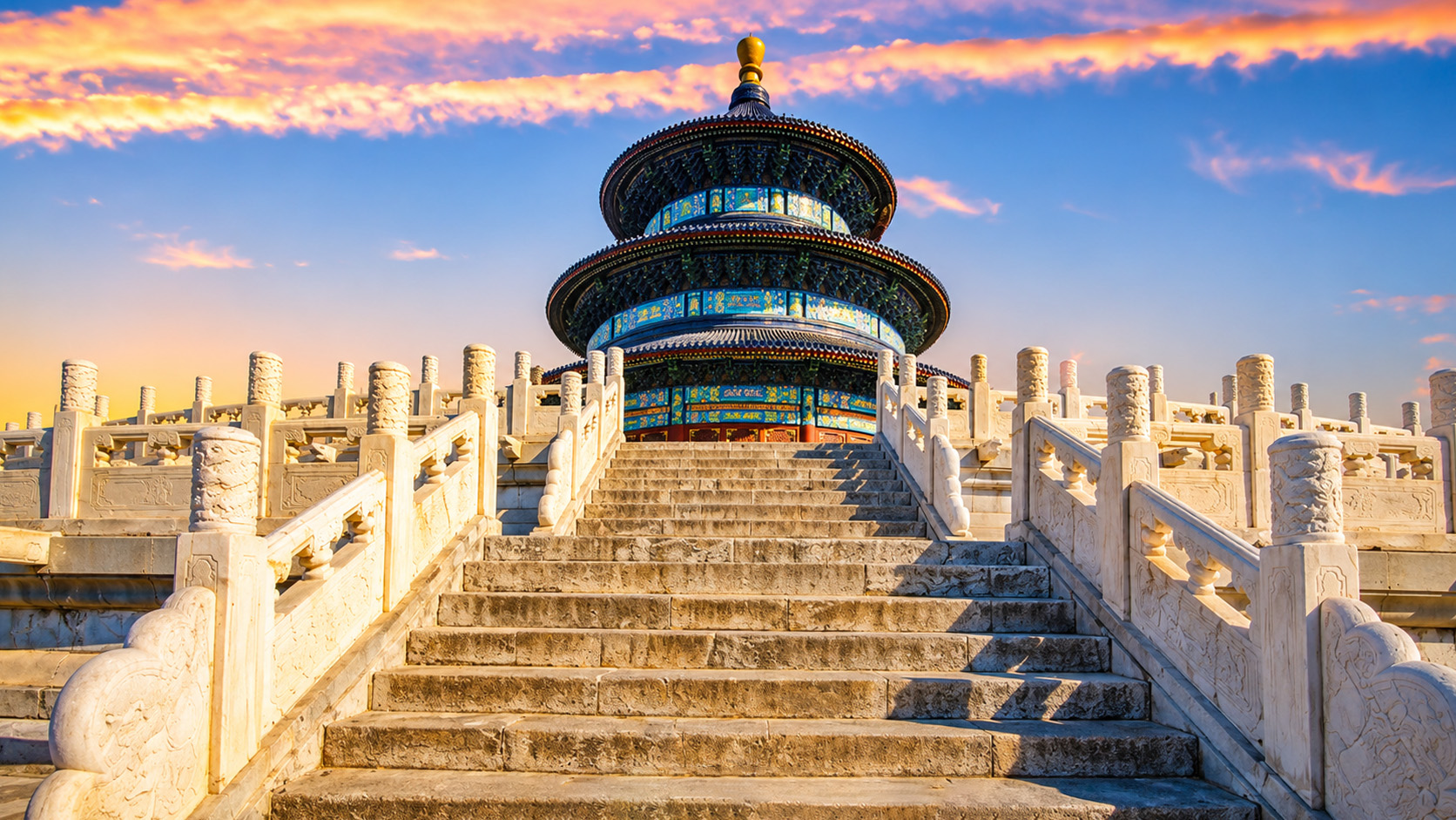 The Temple of Heaven glowing above Beijing at sunset