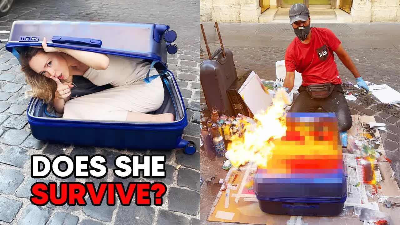 She hid inside the suitcase - then the street artist started burning it