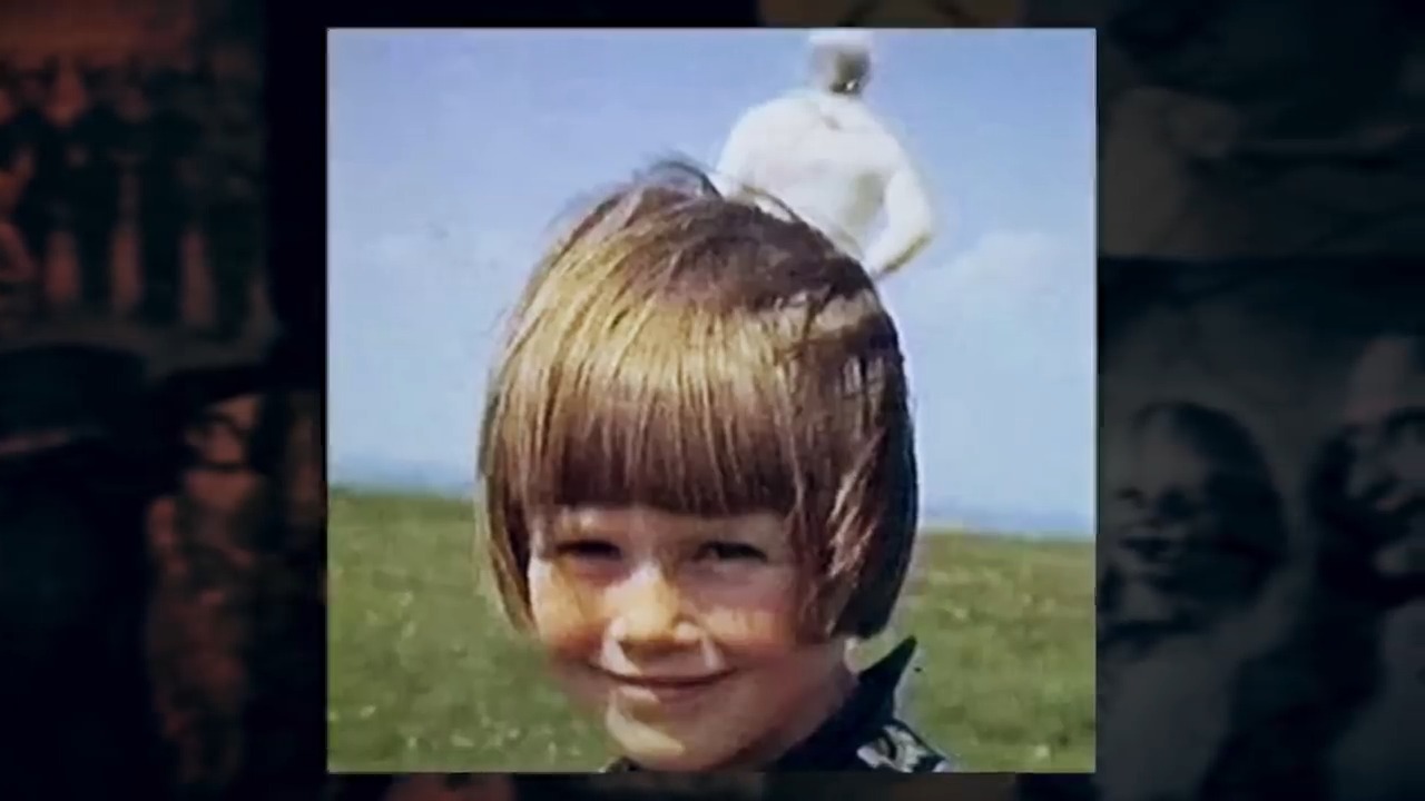 A little girl smiled in a field - then a white figure appeared behind ...