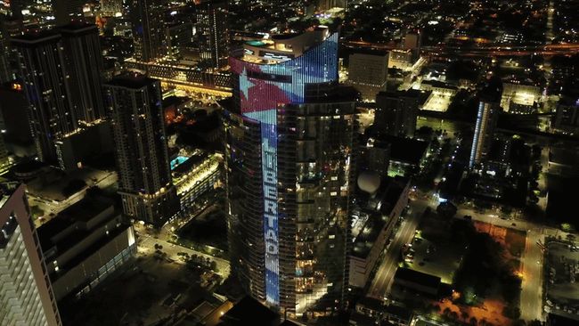 Miami skyscraper lights up with giant Cuban flag