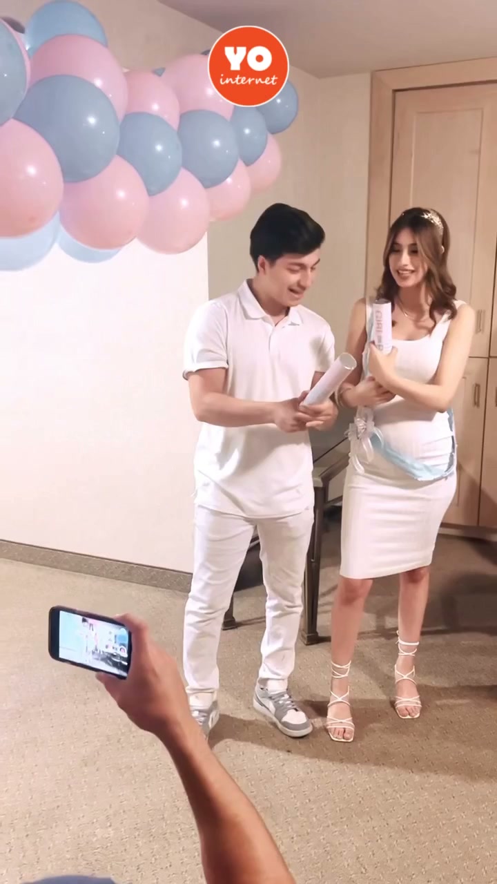 Excited parents-to-be celebrate after discovering their baby's gender