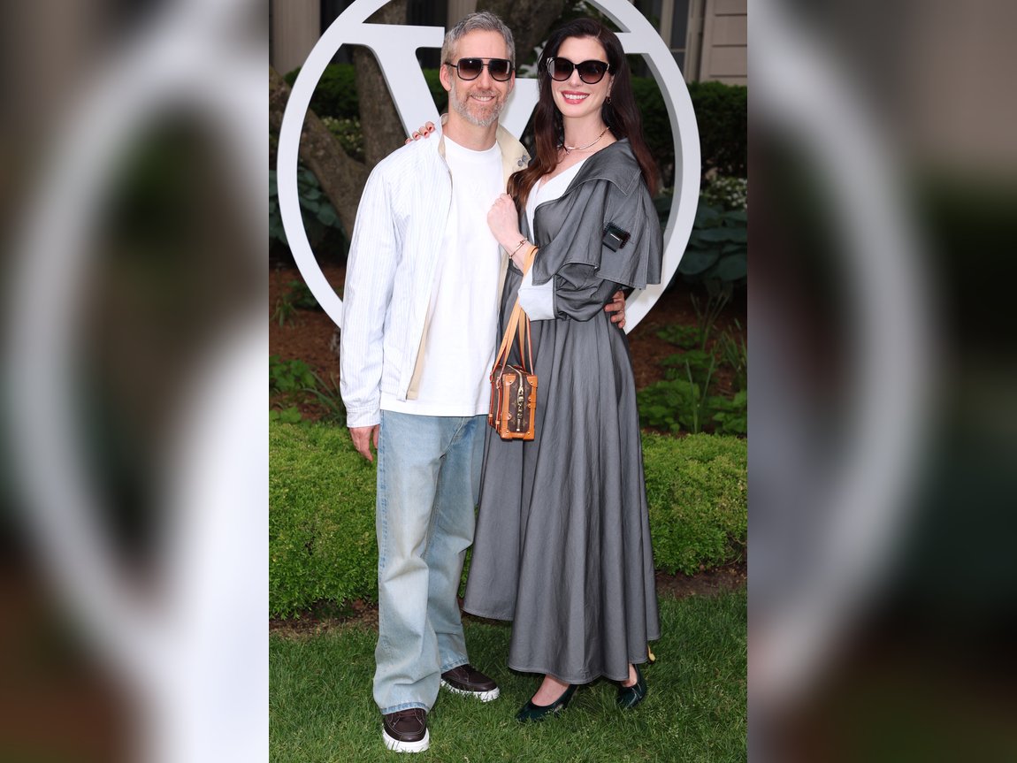 Anne Hathaway and Adam Shulman turn fashion show into date night