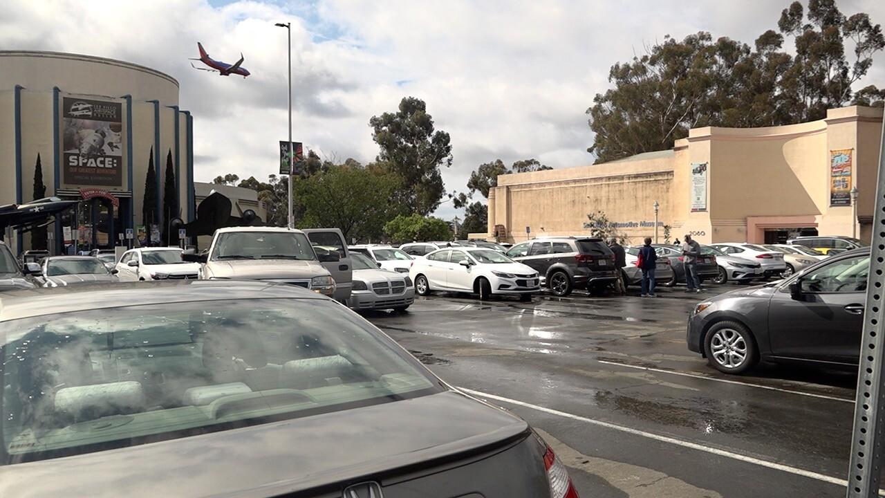 San Diego ditches parking fees, rolls back trash costs